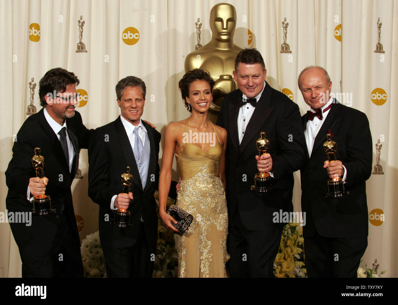 Actress and presenter Jessica Alba poses with Christopher Boyes ...