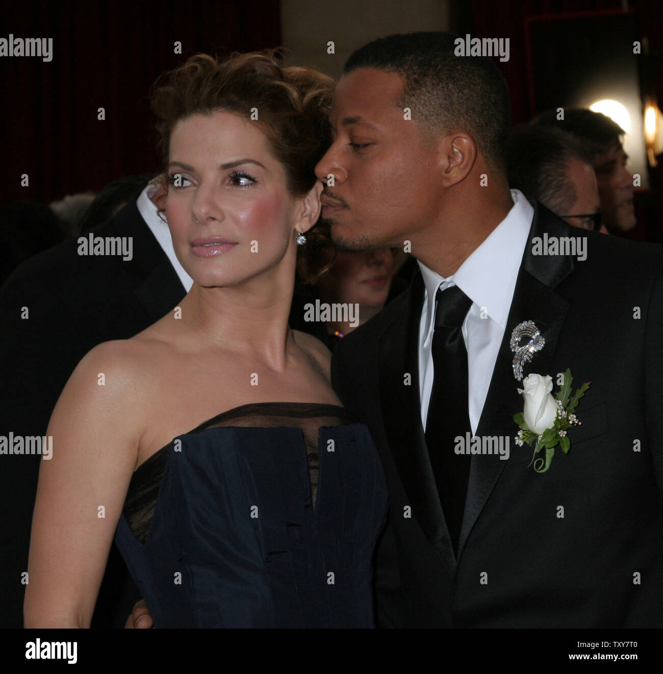 Trevor Howard and Sandra Bullock arrive for the 78th Annual Academy ...