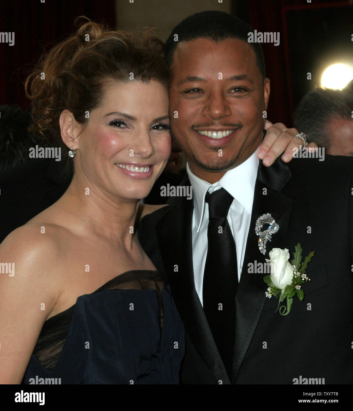 Trevor Howard and Sandra Bullock arrive for the 78th Annual Academy ...