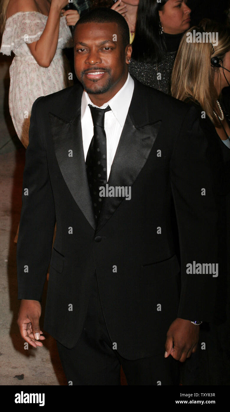 Actor Chris Tucker arrives on the red carpet at the Vanity Fair Oscar ...