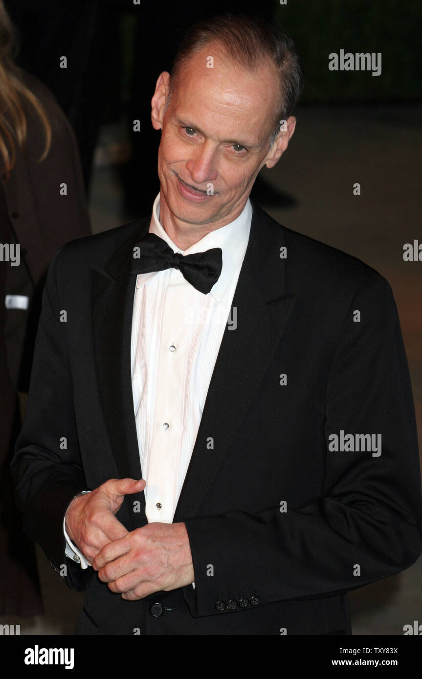 Actor/director John Watters arrives on the red carpet at the Vanity ...