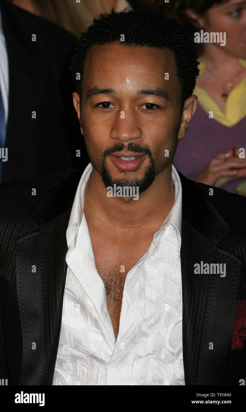Singer John Legend arrives on the red carpet at the Vanity Fair Oscar ...