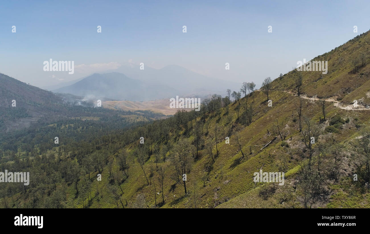 mountain landscape slopes mountains covered with green tropical forest ...