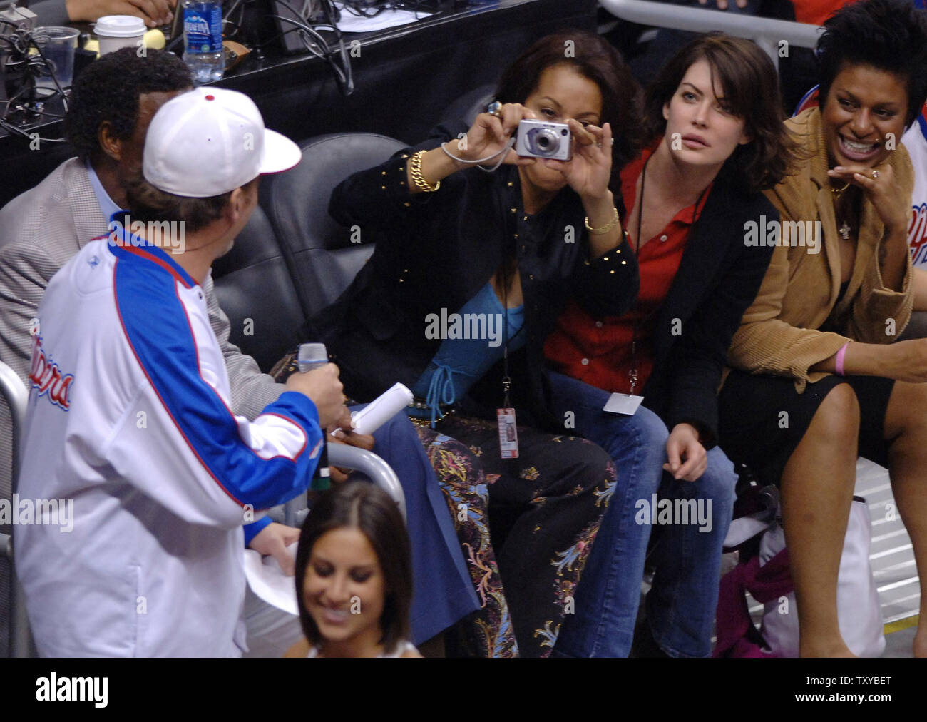 Ruby Baylor (C), the wife of basketball great Elgin Baylor takes a ...