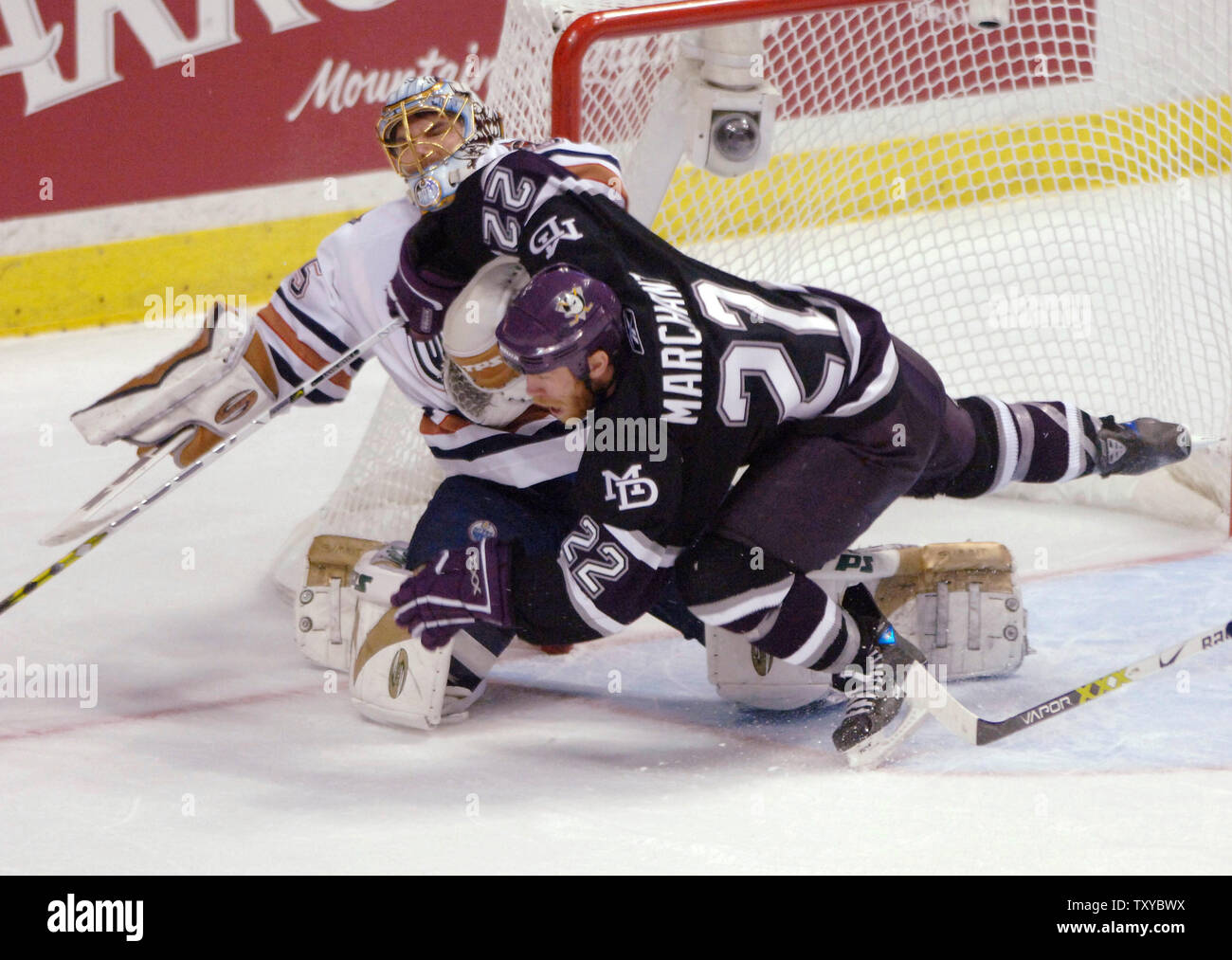 The Anaheim Mighty Ducks Todd Marchant (22) collides with the Edmonton ...