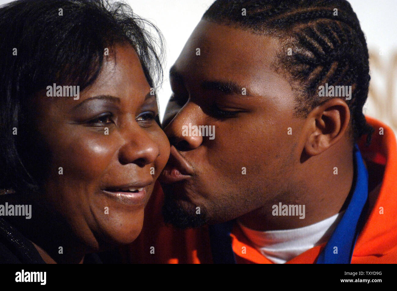 Joyce Allen (L) gets a kiss from her son Jeremy 'Mouse' Allen as they ...