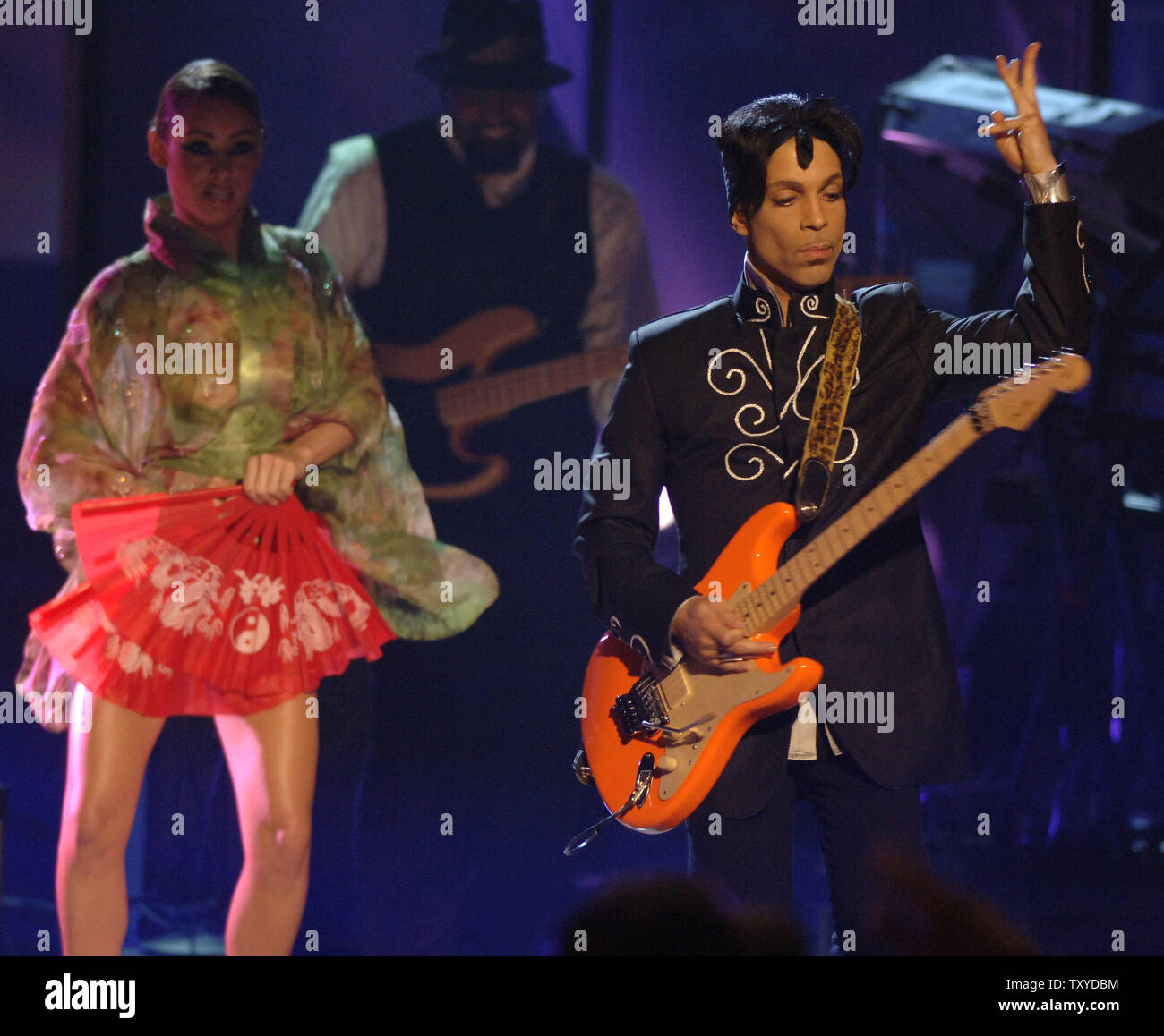 Prince (R) performs "3121" during the 2006 BET Awards at the Shrine ...