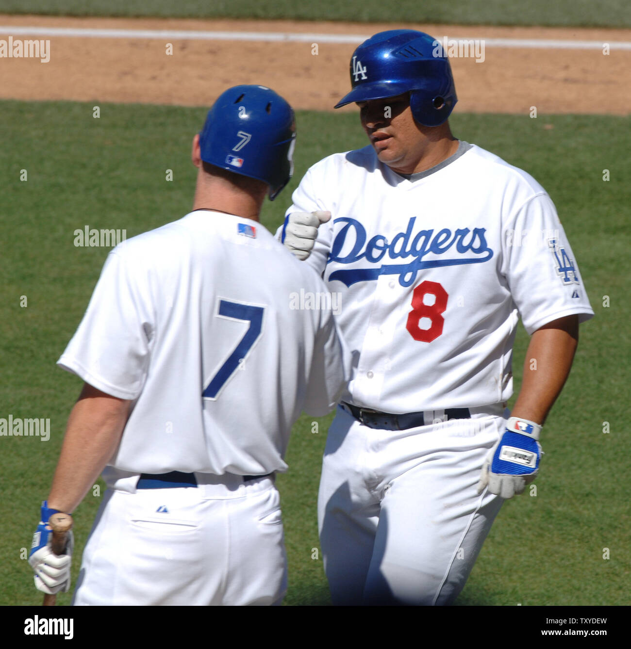 Los Angeles Dodgers' pinch-hitter Olmedo Saenz celebrates with teammate ...