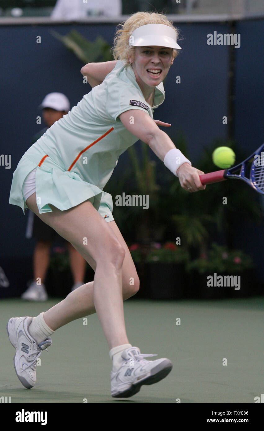 American Amy Frazier prepares a backhand during her match with Jill ...