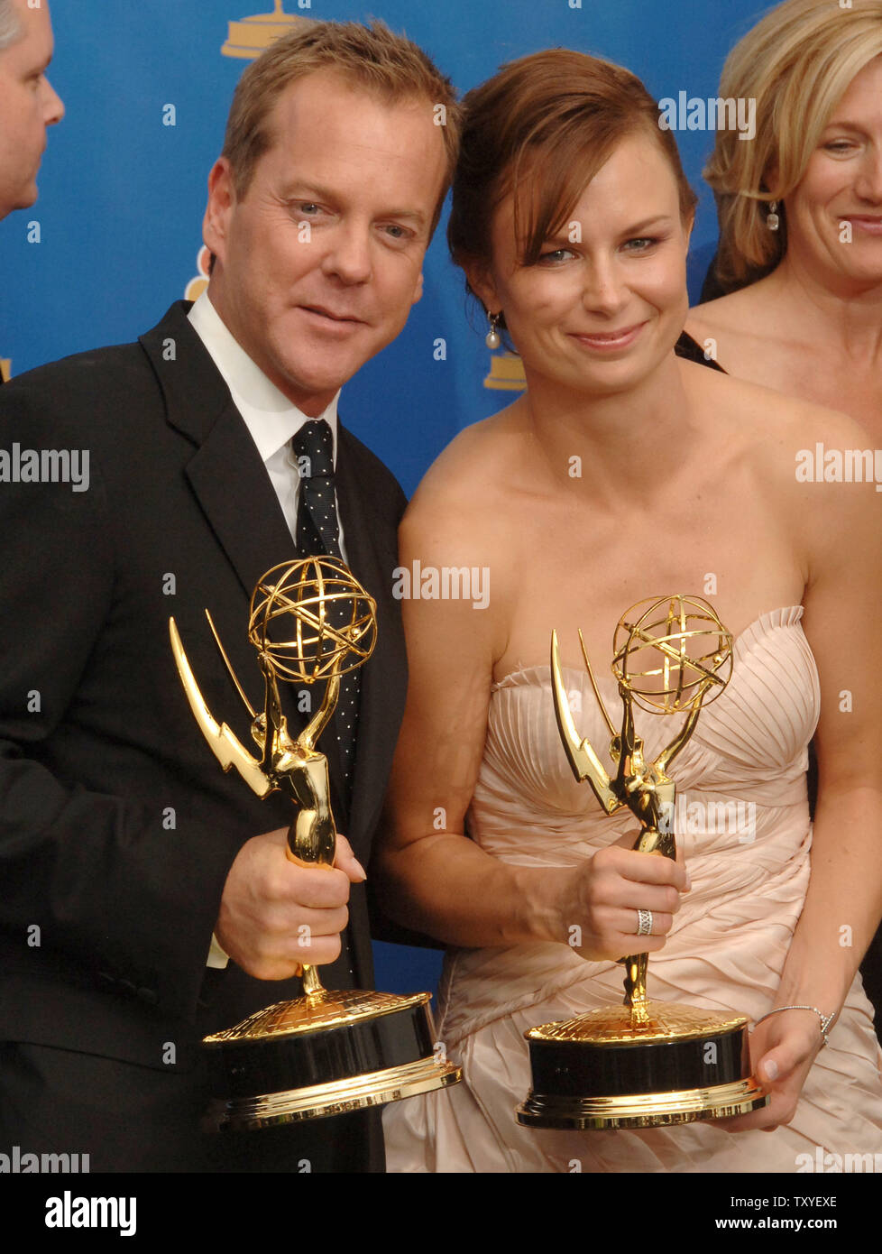 Kiefer Sutherland , left, and Mary Lynn Rajskub hold their awards for ...