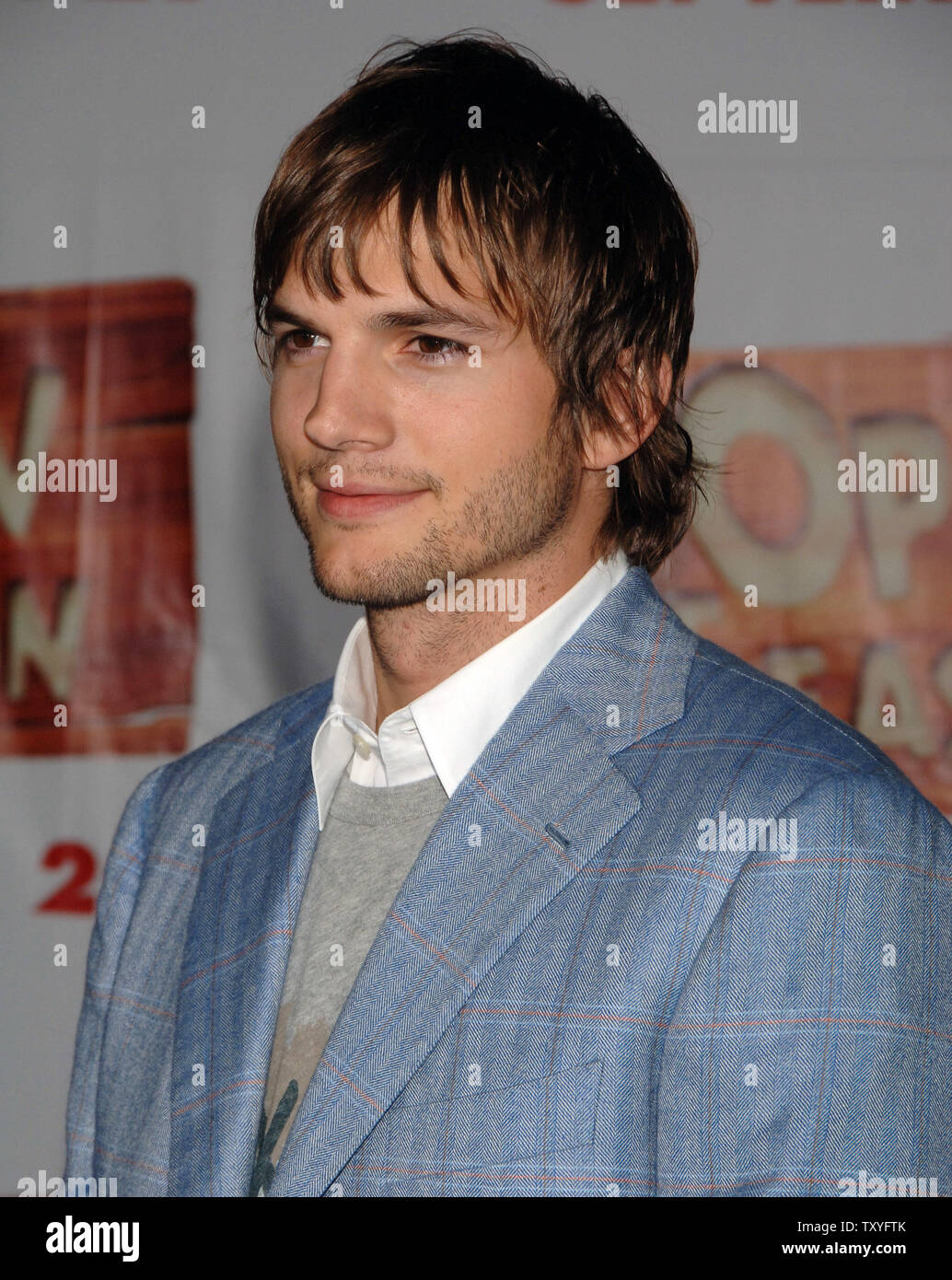Cast member Ashton Kutcher, the voice of Elliott in the animated motion ...