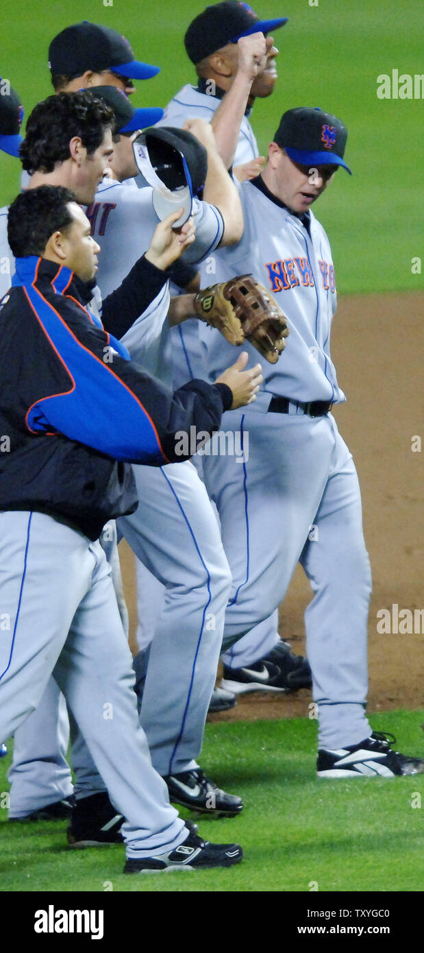 New York Mets' relief pitcher Billy Wagner (R) celebrates the Mets' 9-5 ...