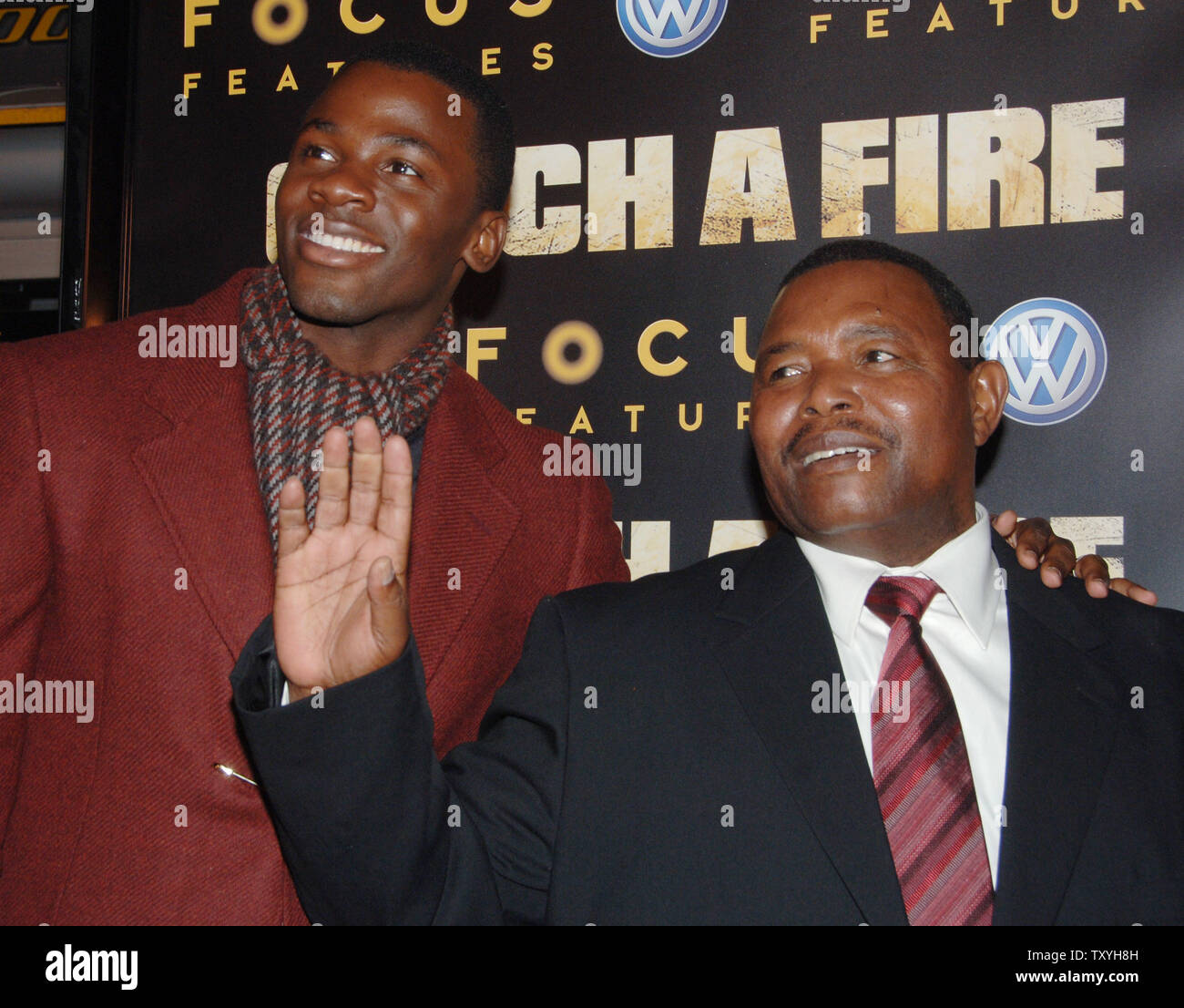 Cast member Derek Luke (L) smiles with Patrick Chamusso during the ...