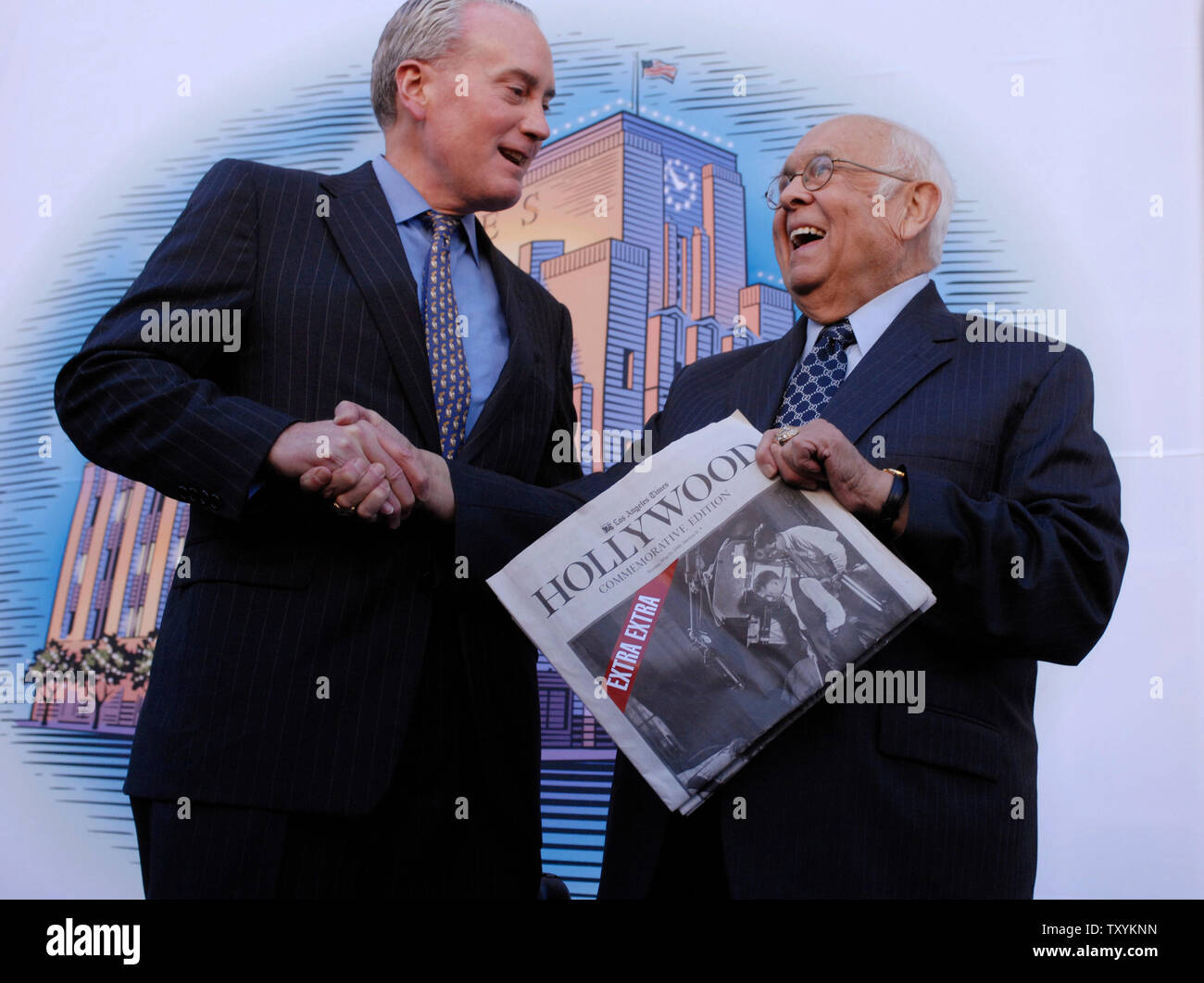 Los Angeles Times publisher David Hiller (L) and the Honorary Mayor of ...