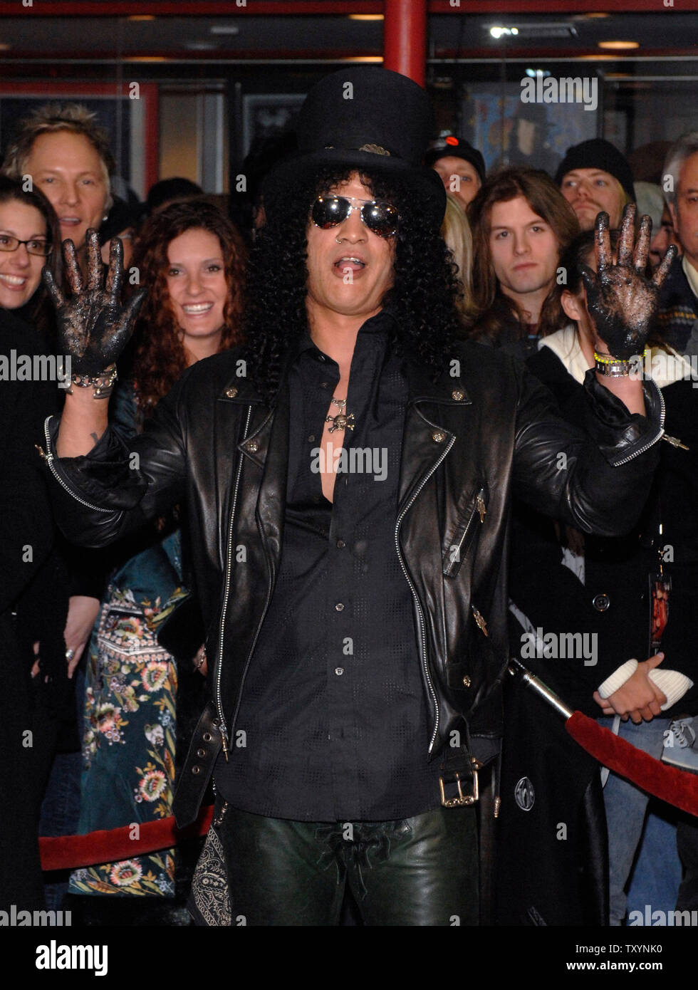 Slash is inducted into Hollywood's "RockWalk" with a ceremony where he ...