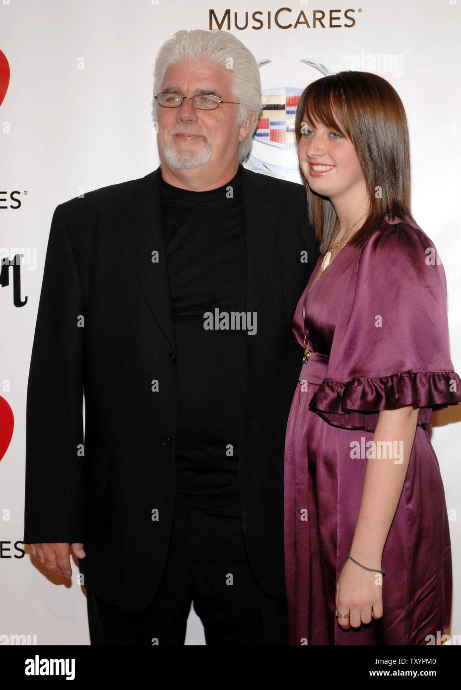 Singer Michael McDonald (L) and his daughter Scarlett arrive at the ...