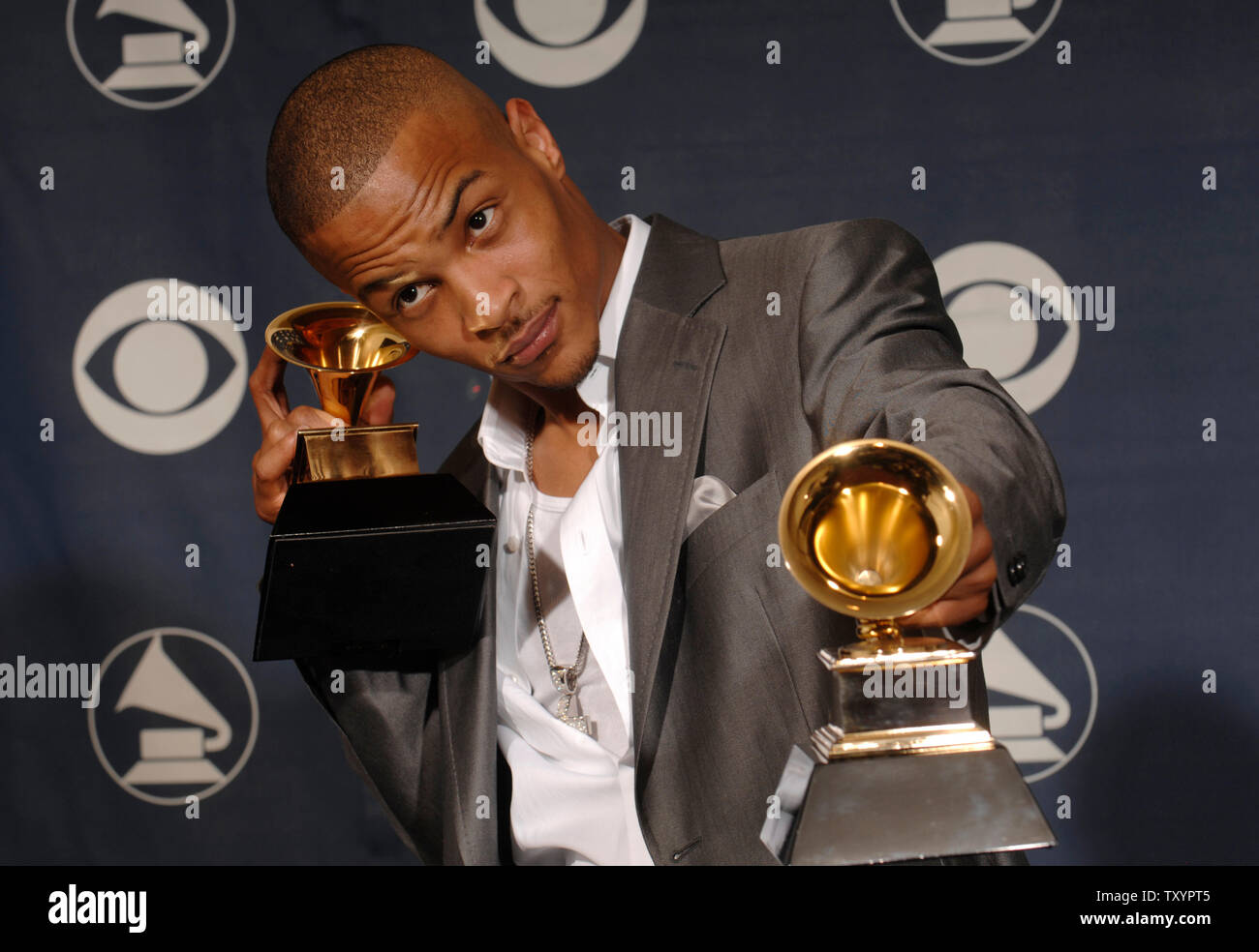 T.I. displays his Grammys for best rap solo performance and for best ...