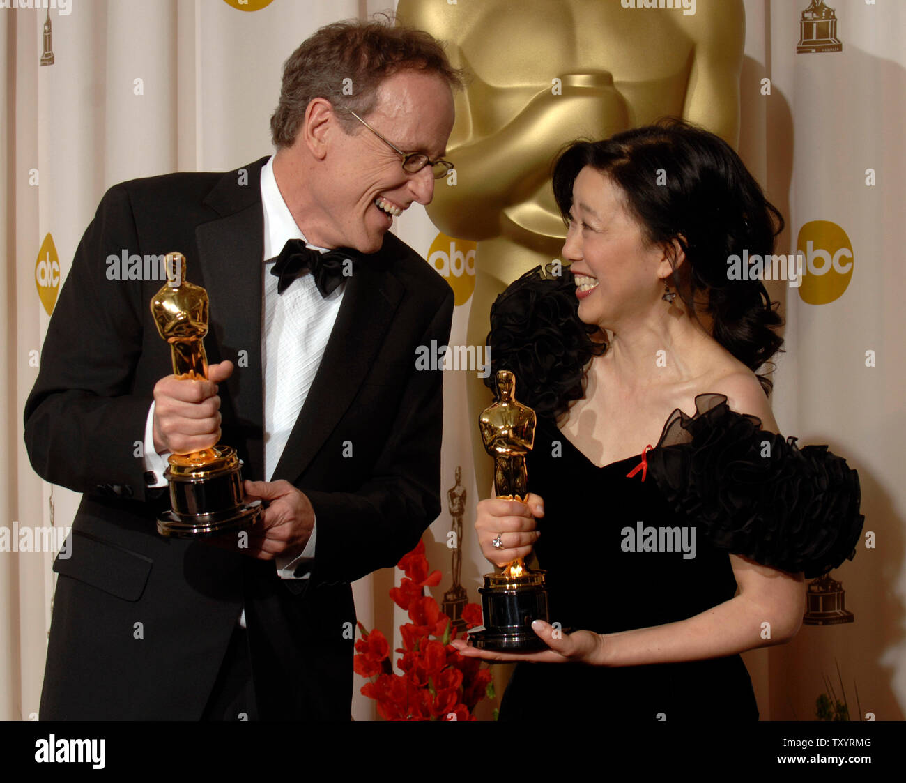 Ruby Yang and Thomas Lennon pose for photos after winning the Oscar for ...