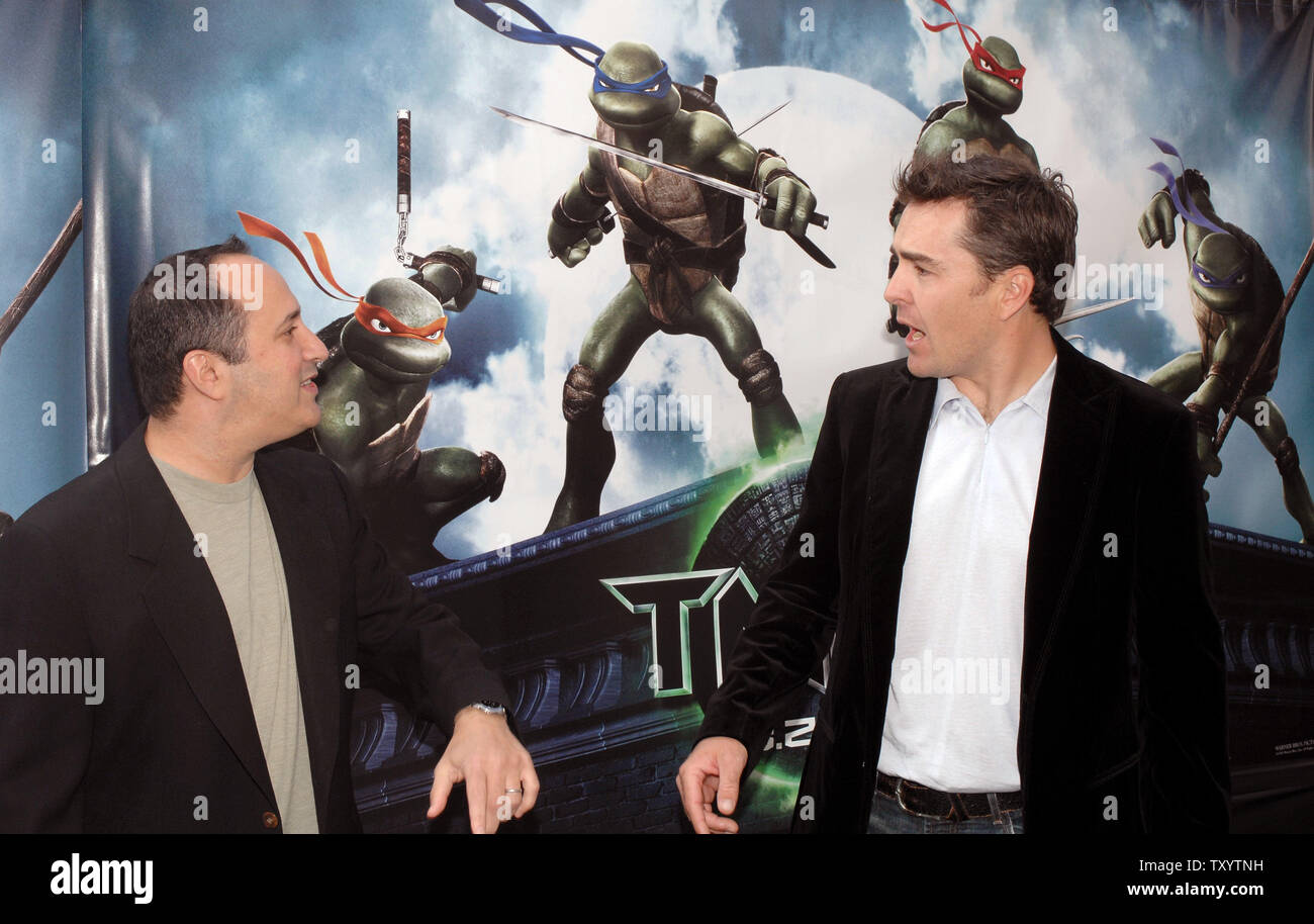 Nolan North (R), who voices the character Raphael and Mitchell ...