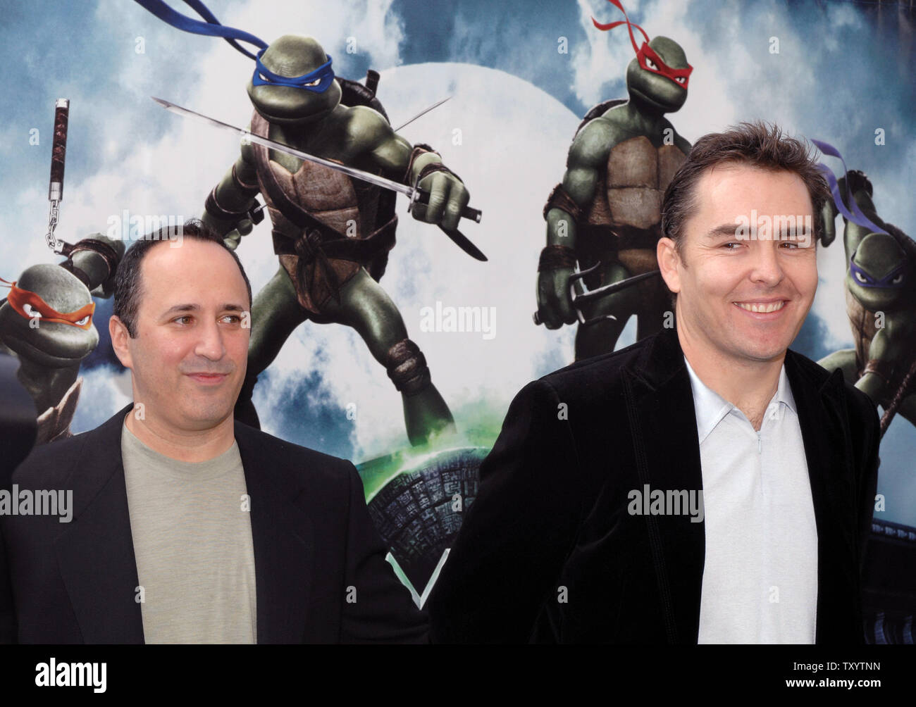 Nolan North (R), who voices the character Raphael and Mitchell ...