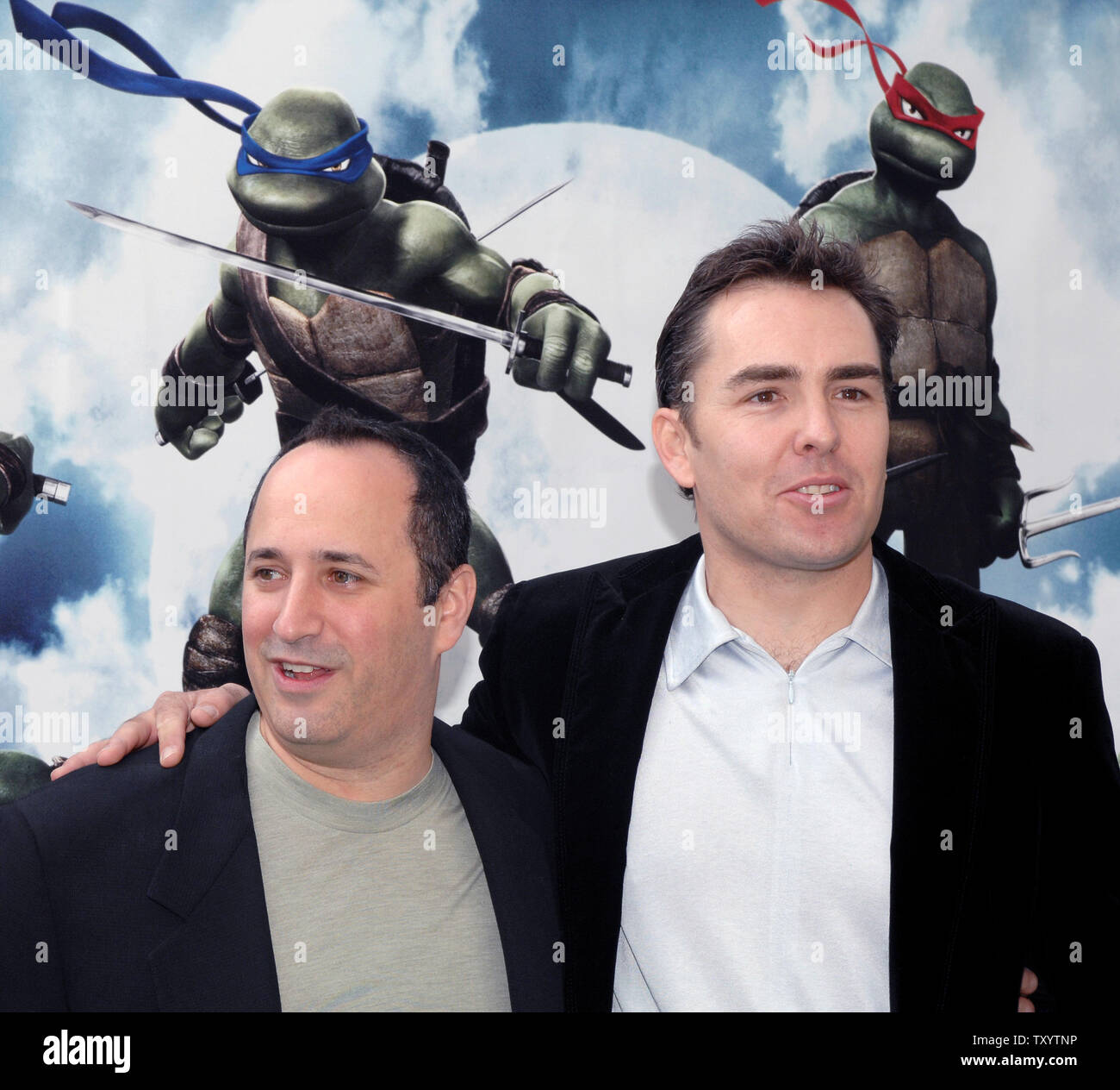 Nolan North (R), who voices the character Raphael and Mitchell ...