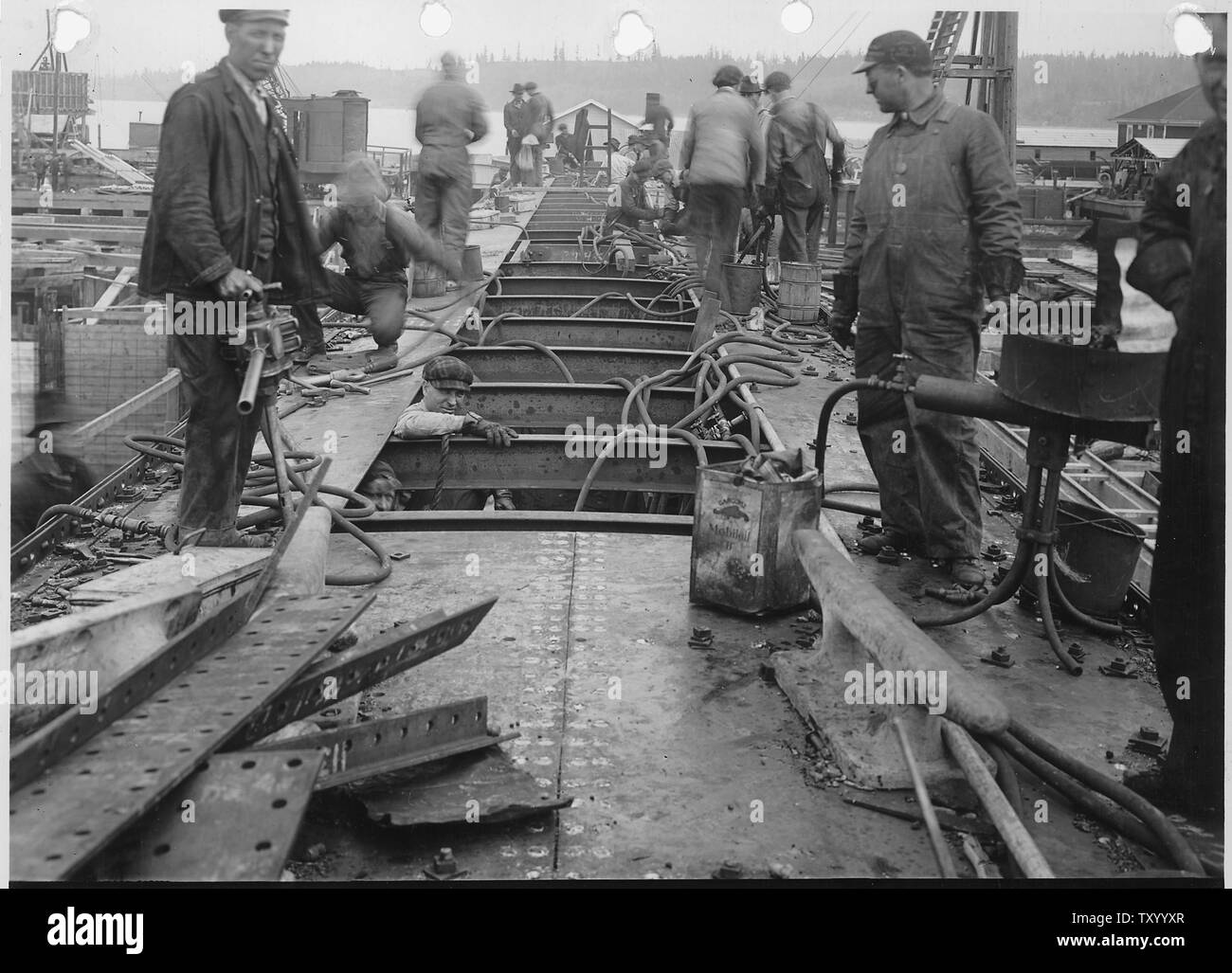 Construction of caisson for shipbuilding dock, deck view looking east ...
