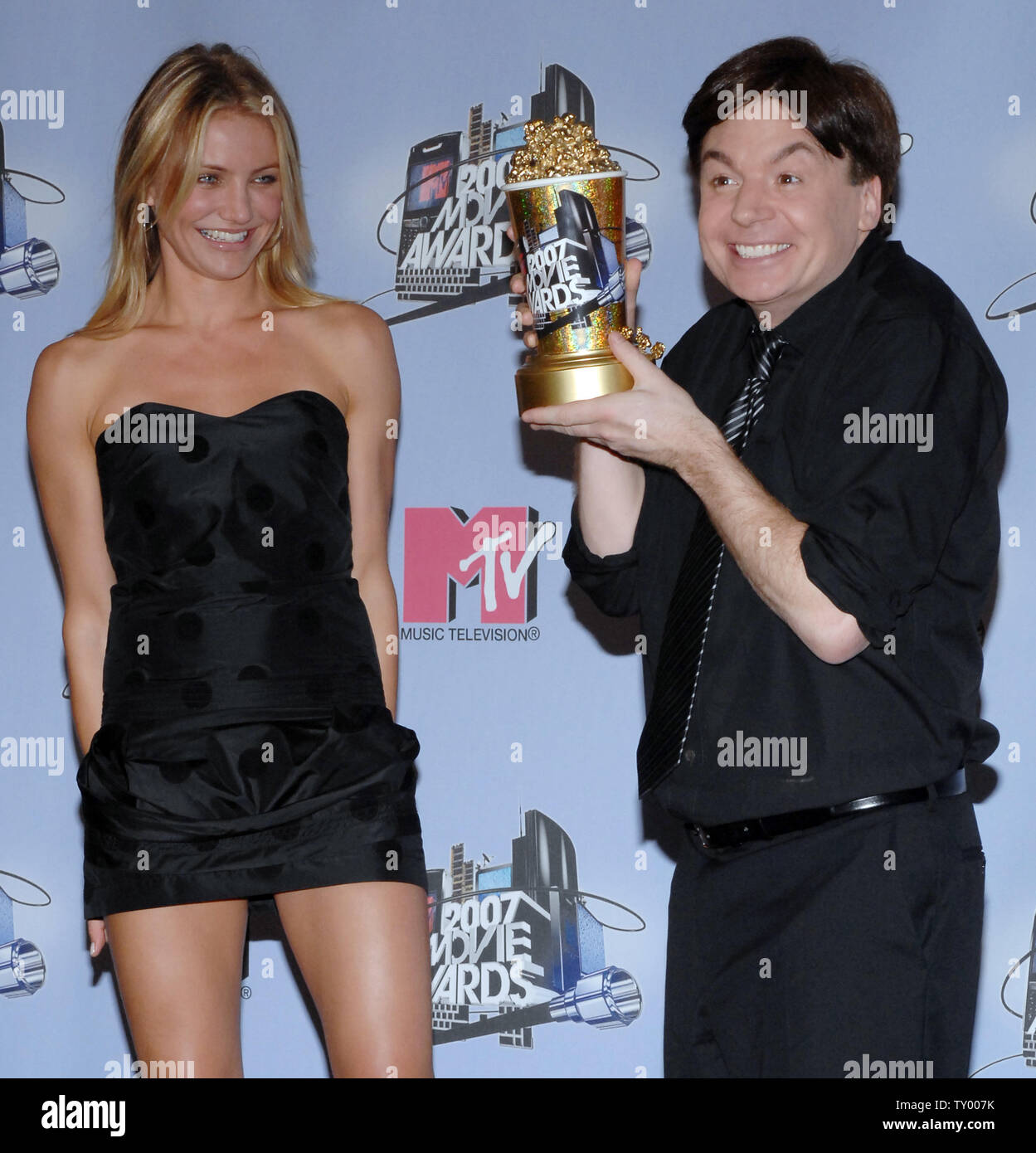 Mike Myers appears backstage with his MTV Generation Award, along with ...