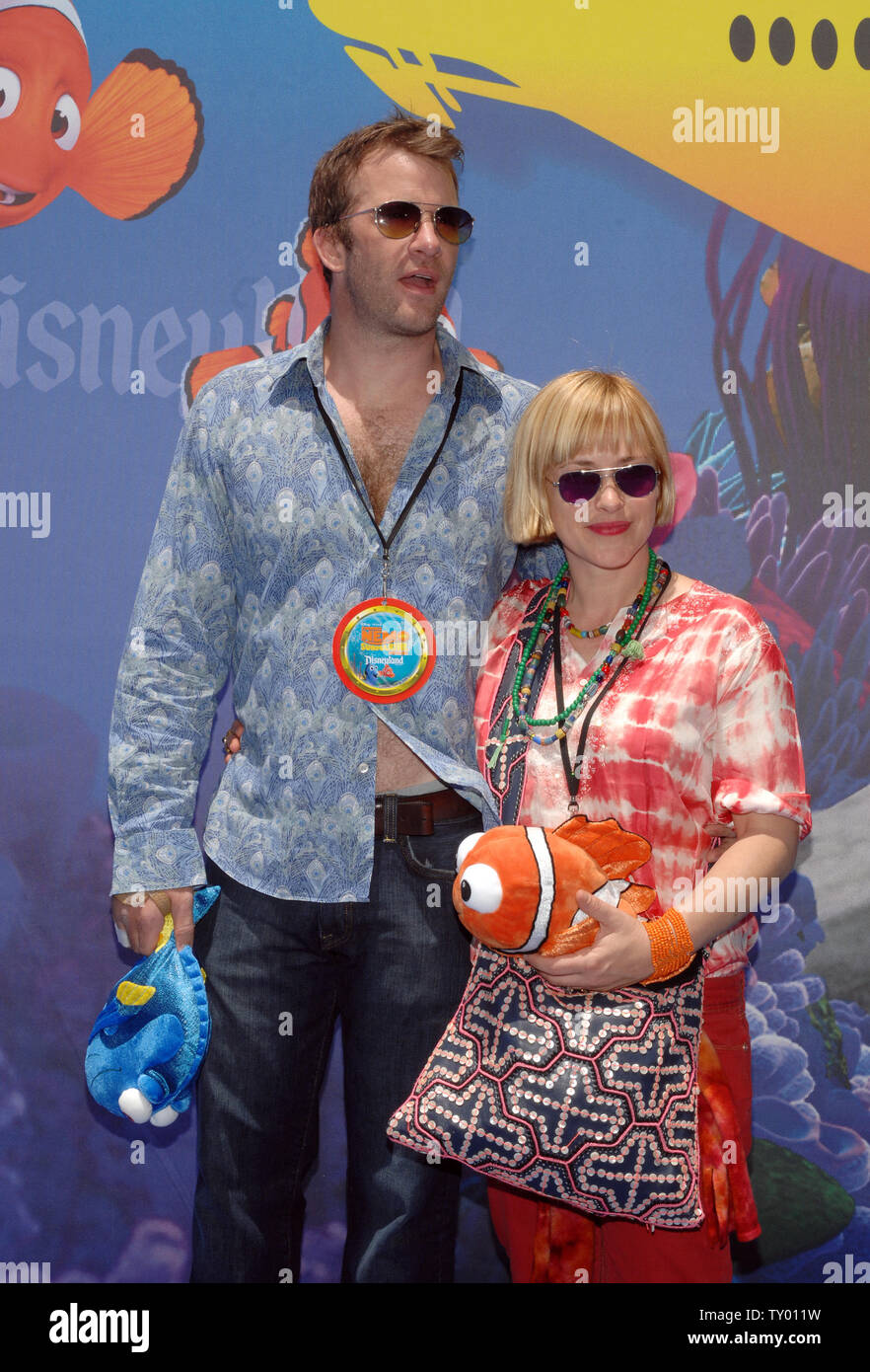 Actress Patricia Arquette and her husband, actor Thomas Jane arrive for ...