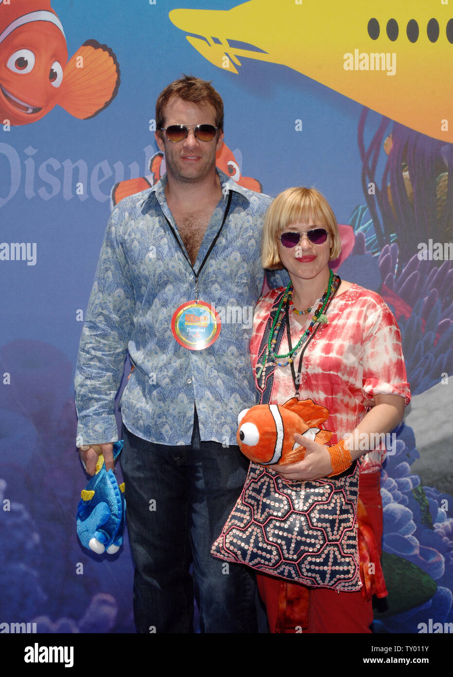 Actress Patricia Arquette and her husband, actor Thomas Jane arrive for ...