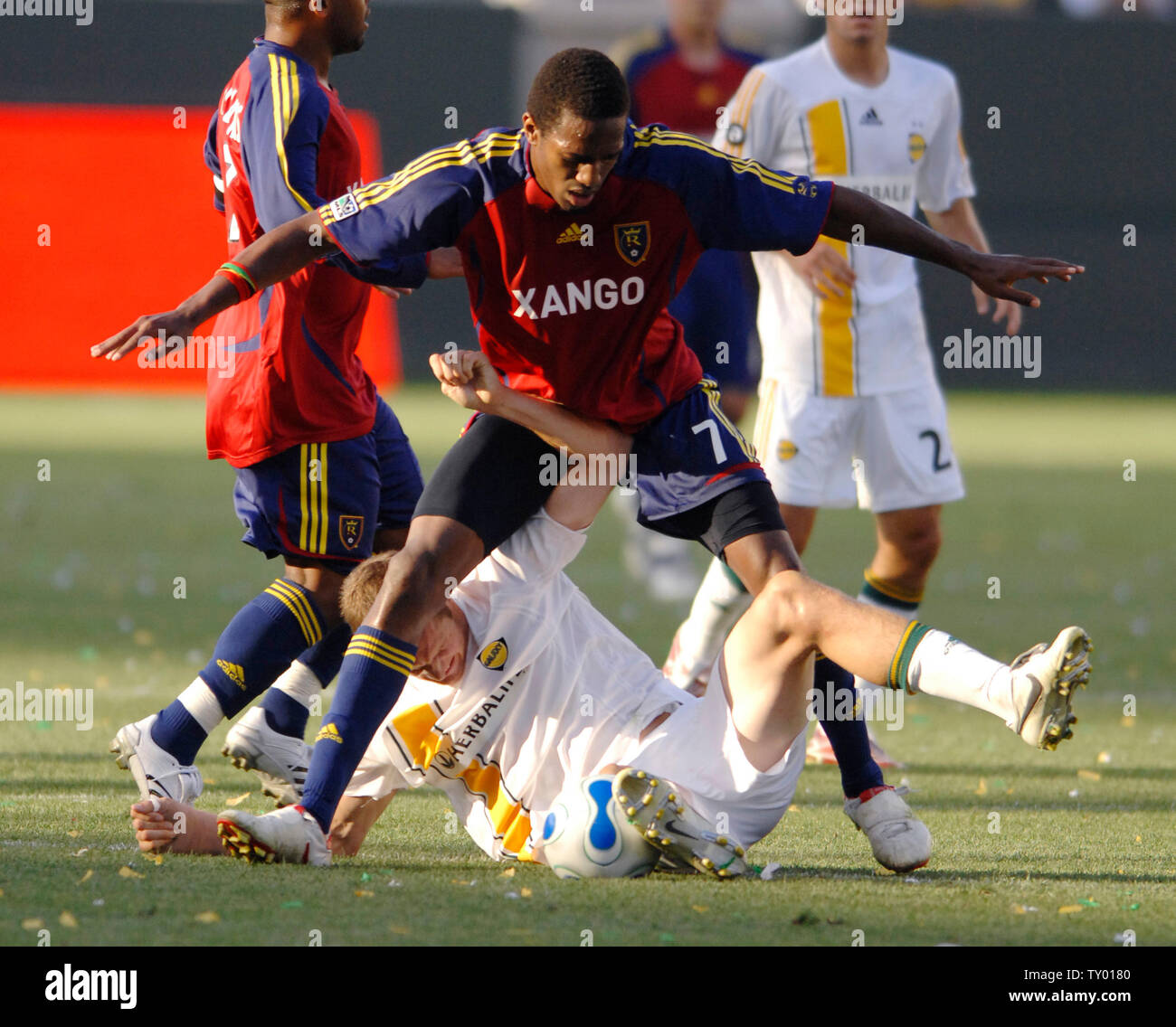 Los Angeles Galaxy Nate Jaqua (bottom) battles for the ball against ...