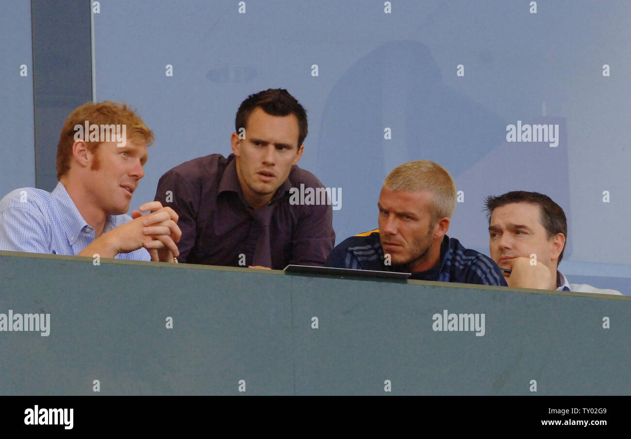 Los Angeles Galaxy President and General Manager Alexi Lalas (L) sits ...