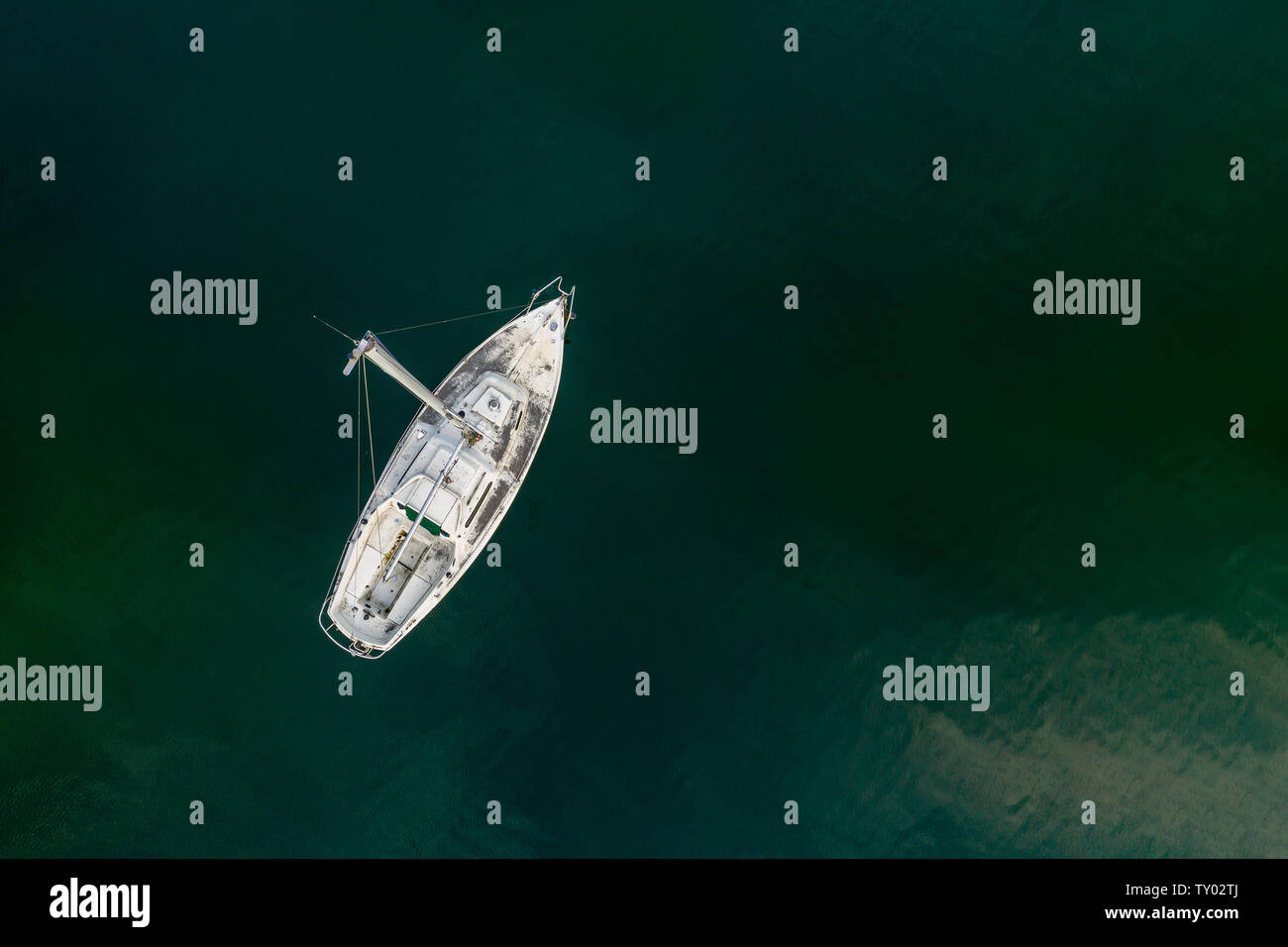 Aerial single sail boat sailing hi-res stock photography and images - Alamy
