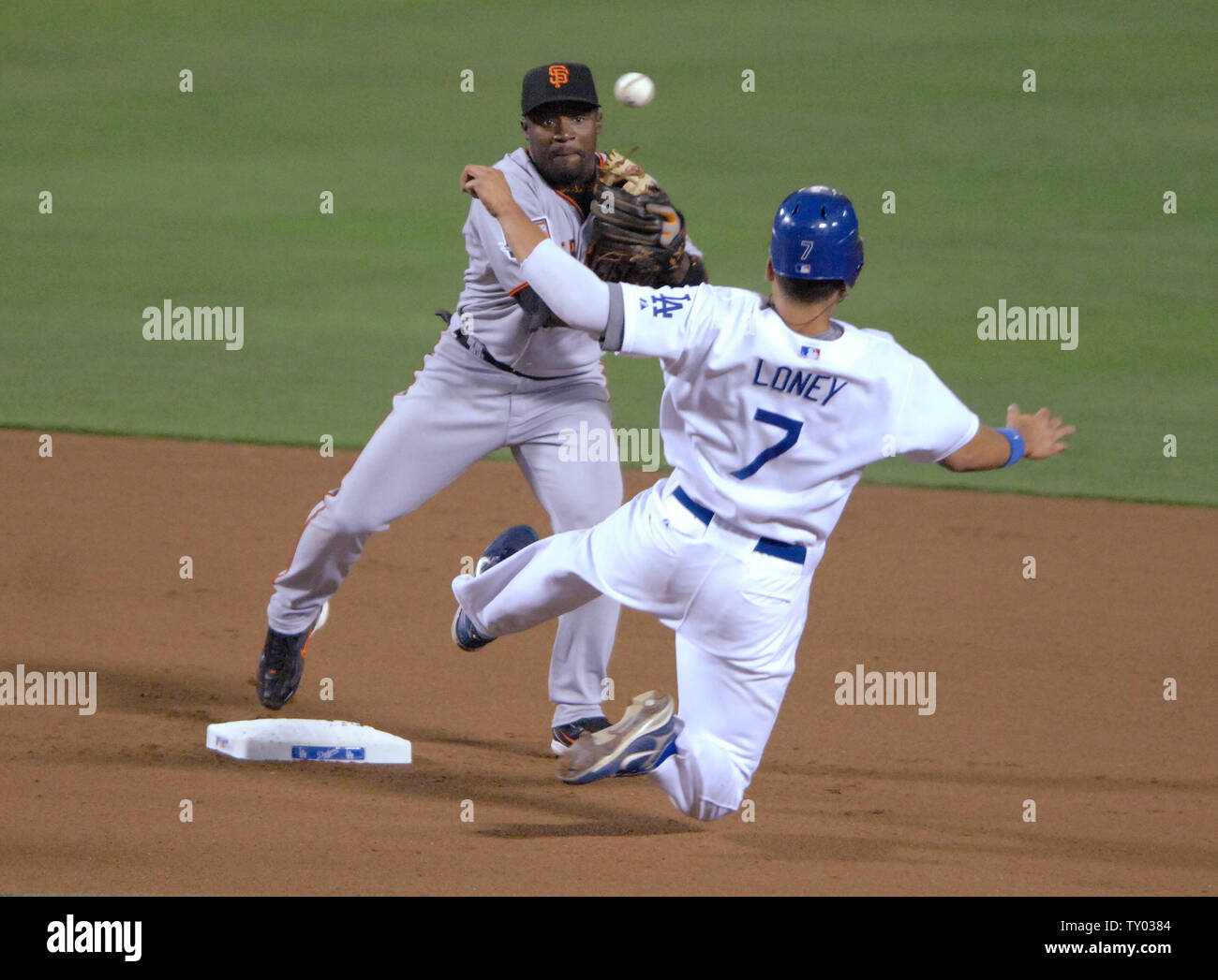 Los Angeles Dodgers James Loney (R) is out at second as San Francisco ...