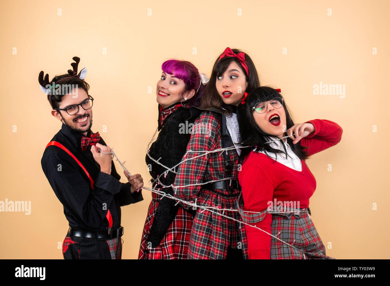 Woman trouble christmas lights hi-res stock photography and images - Alamy
