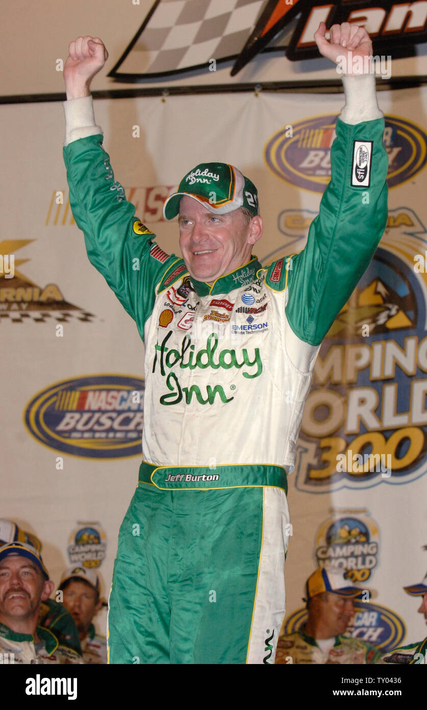 Driver Jeff Burton celebrates winning the NASCAR Busch Series Camping ...