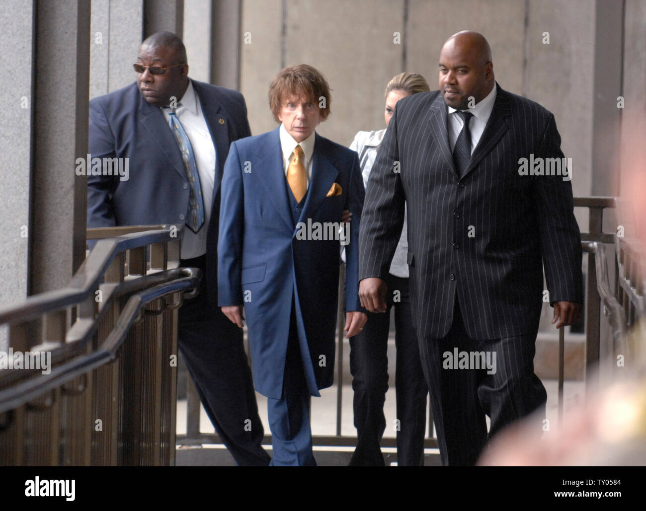 Phil Spector (2nd L) arrives with wife Rachelle Spector (2nd R) and two ...