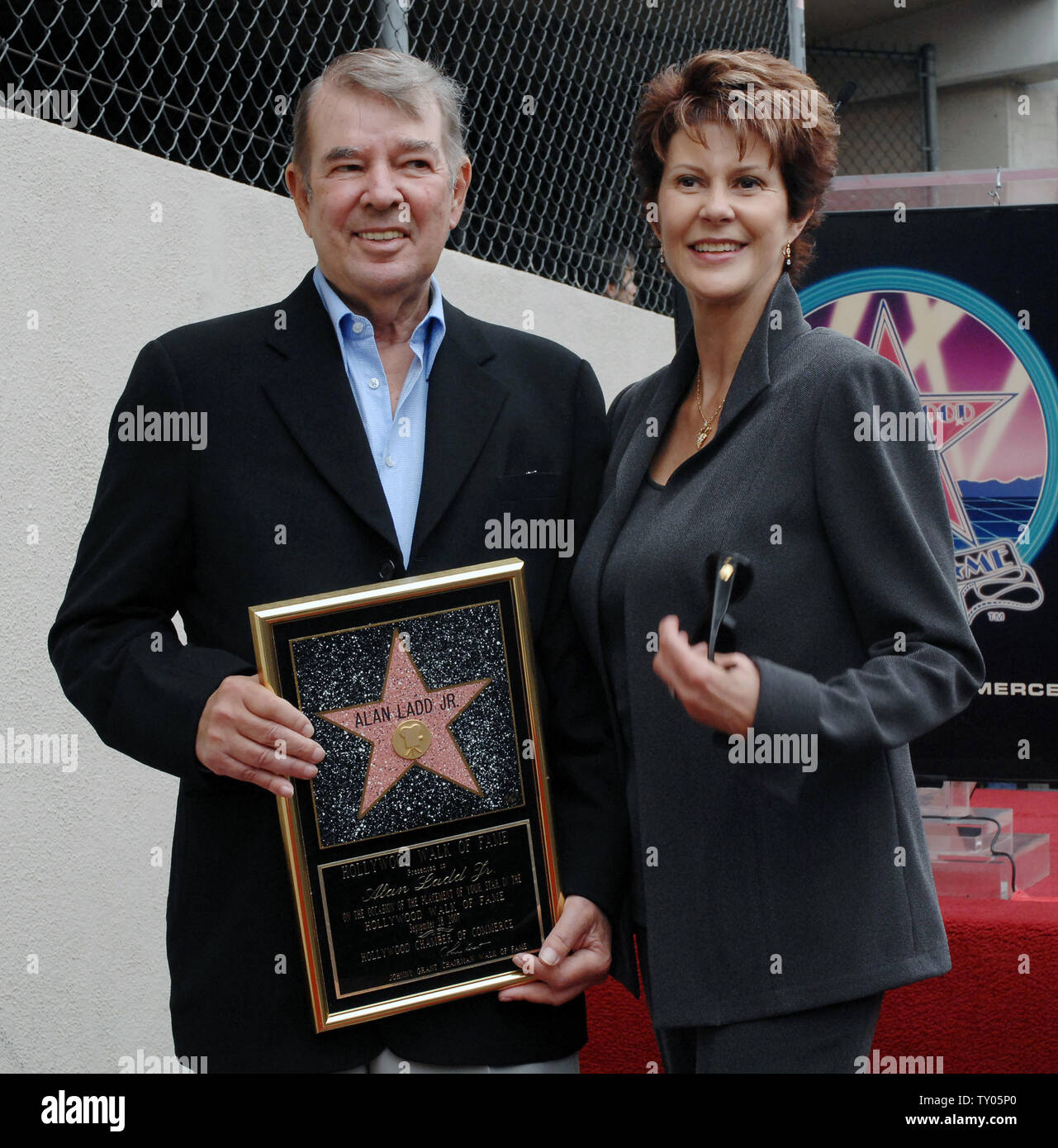 Producer Alan Ladd Jr. holds a replica plaque after he was honored with ...