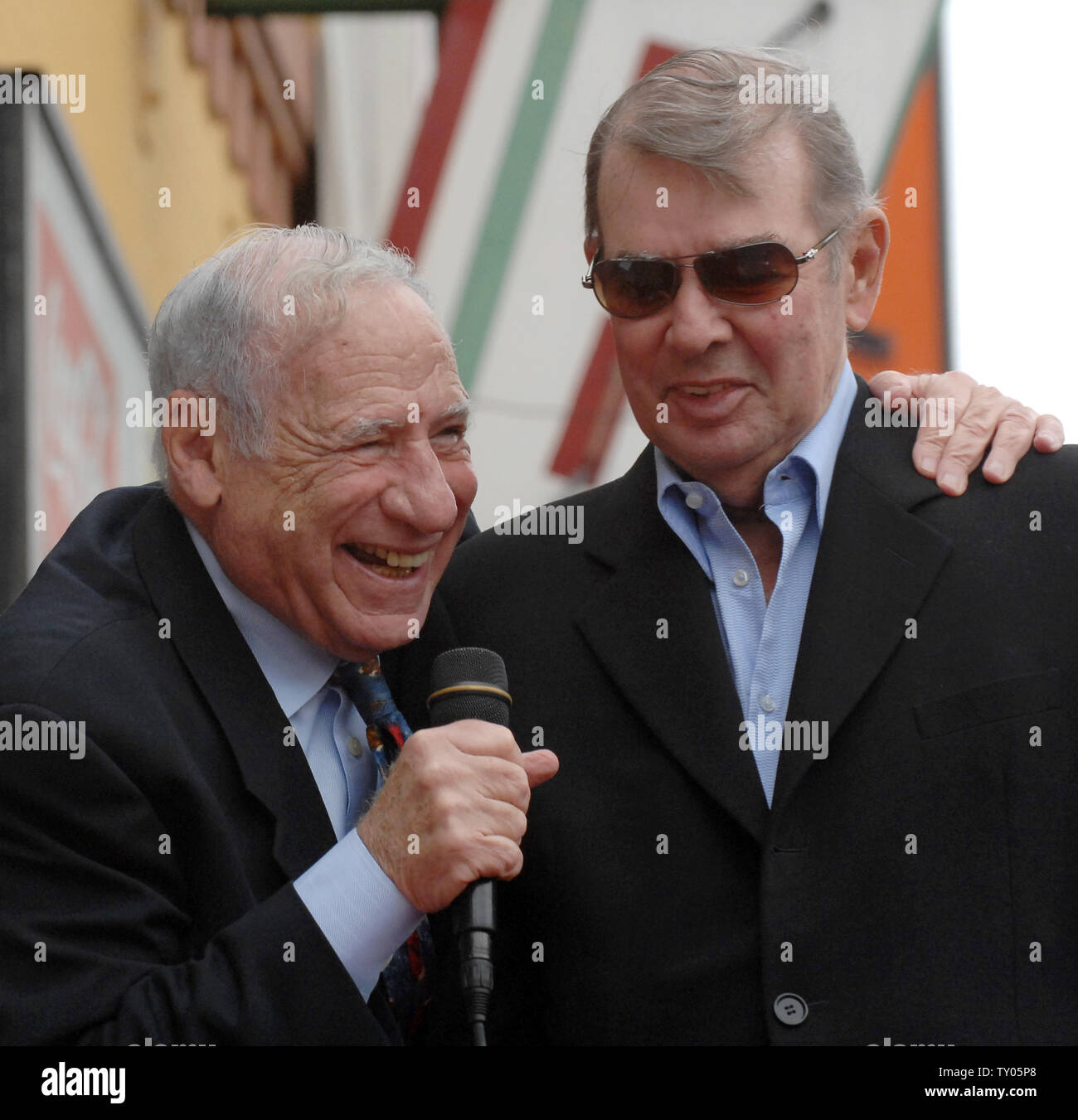 Producer Alan Ladd Jr. (R) shares a light moment with actor/director ...