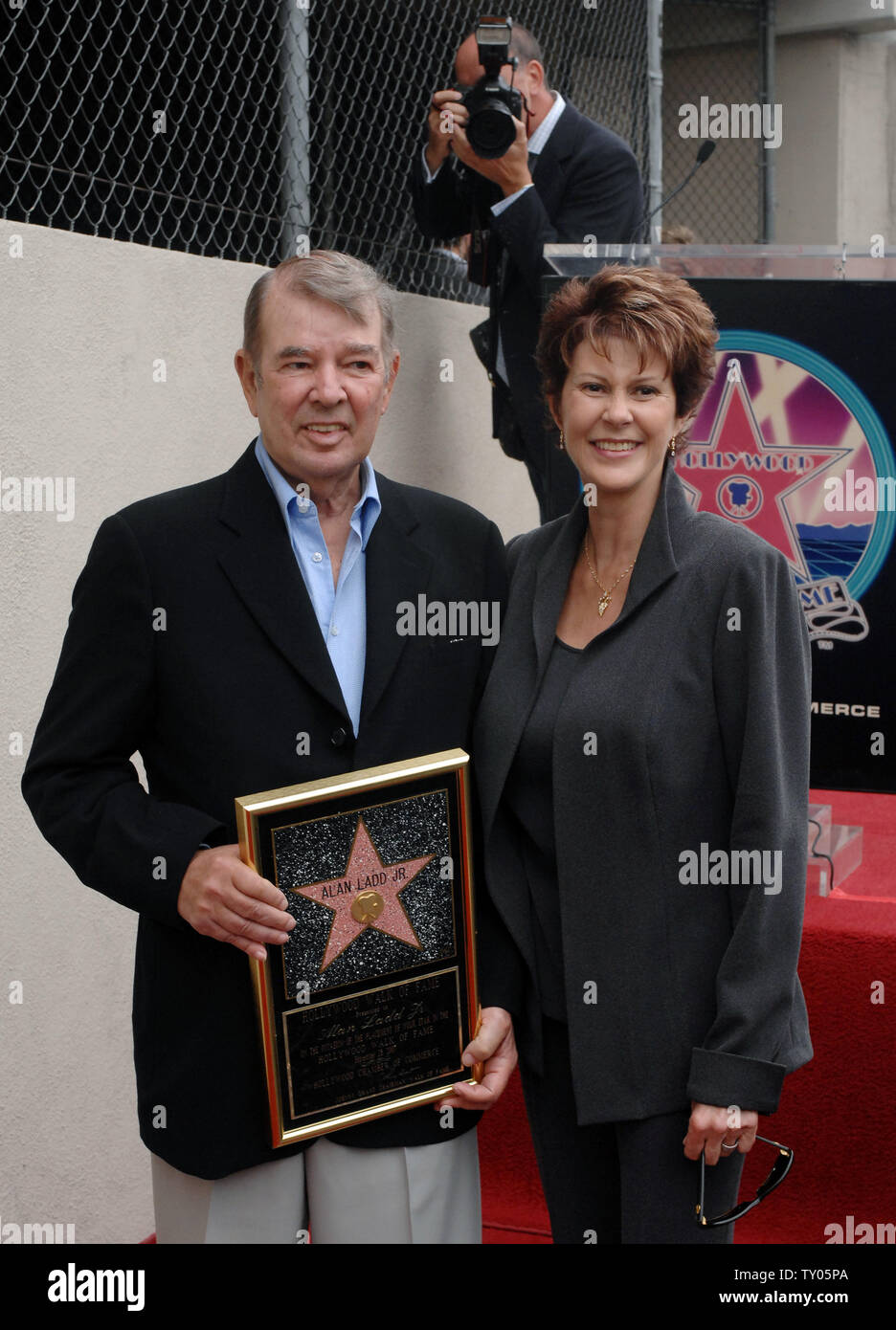 Producer Alan Ladd Jr. holds a replica plaque after he was honored with ...