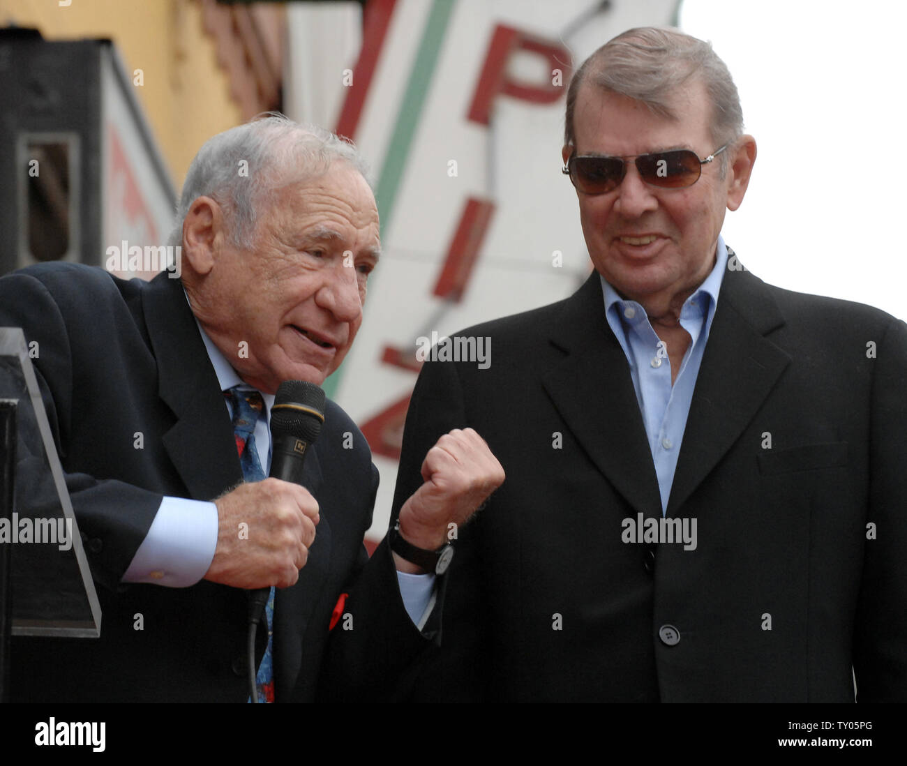 Producer Alan Ladd Jr. (R) shares a light moment with actor/director ...