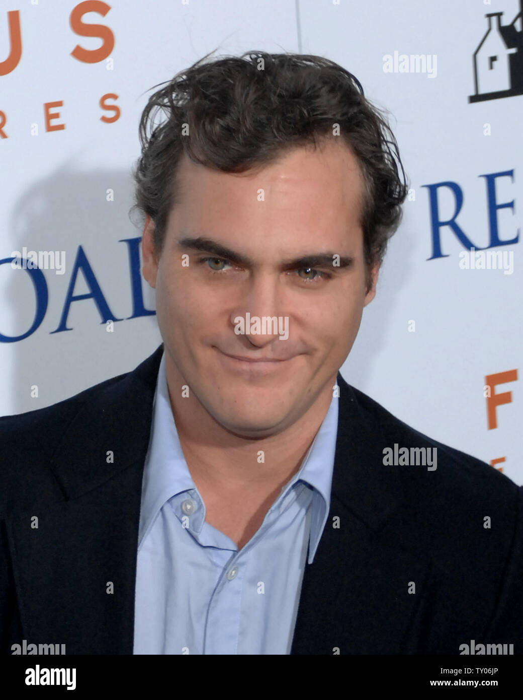 Actor Joaquin Phoenix arrives for the premiere of "Reservation Road" in ...