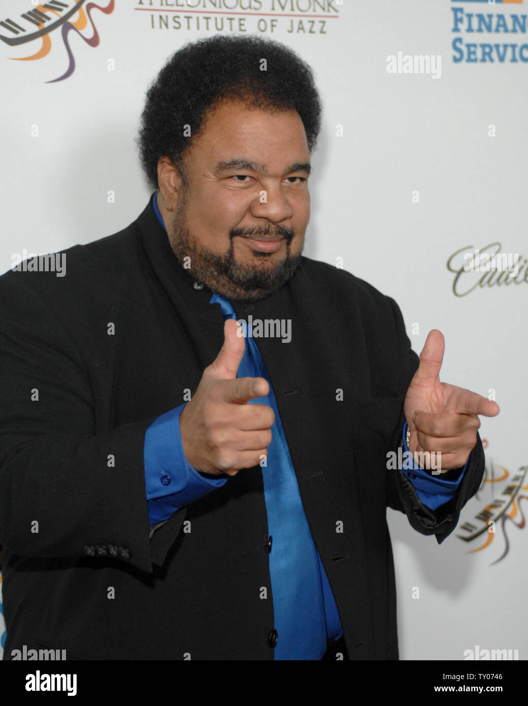 Jazz Artist George Duke gestures to photographers Sunday evening at the ...