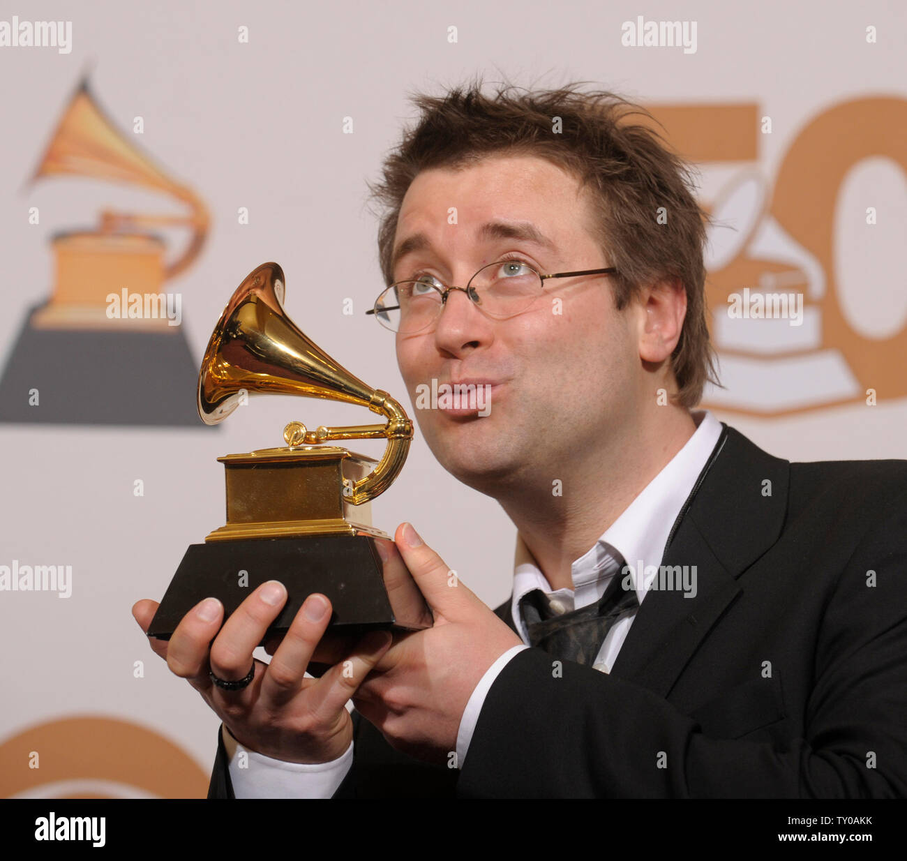 Paul Hicks holds his Grammy for "Love" at the 50th annual Grammy Awards at the Staples Center in ...