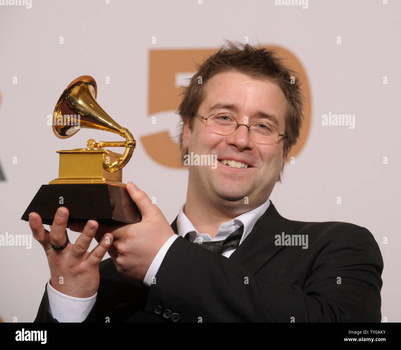 Paul Hicks holds his Grammy for "Love" at the 50th annual Grammy Awards at the Staples Center in ...