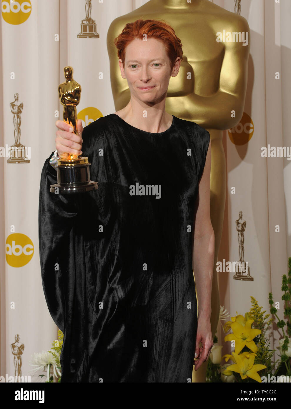 Actress Tilda Swinton poses with her Oscar for Best Supporting Actress ...