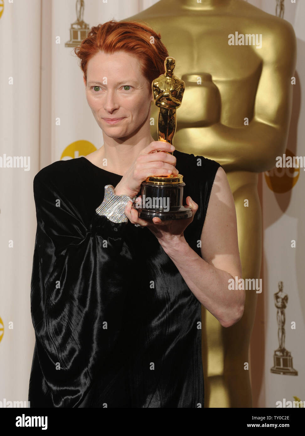 Actress Tilda Swinton poses with her Oscar for Best Supporting Actress ...