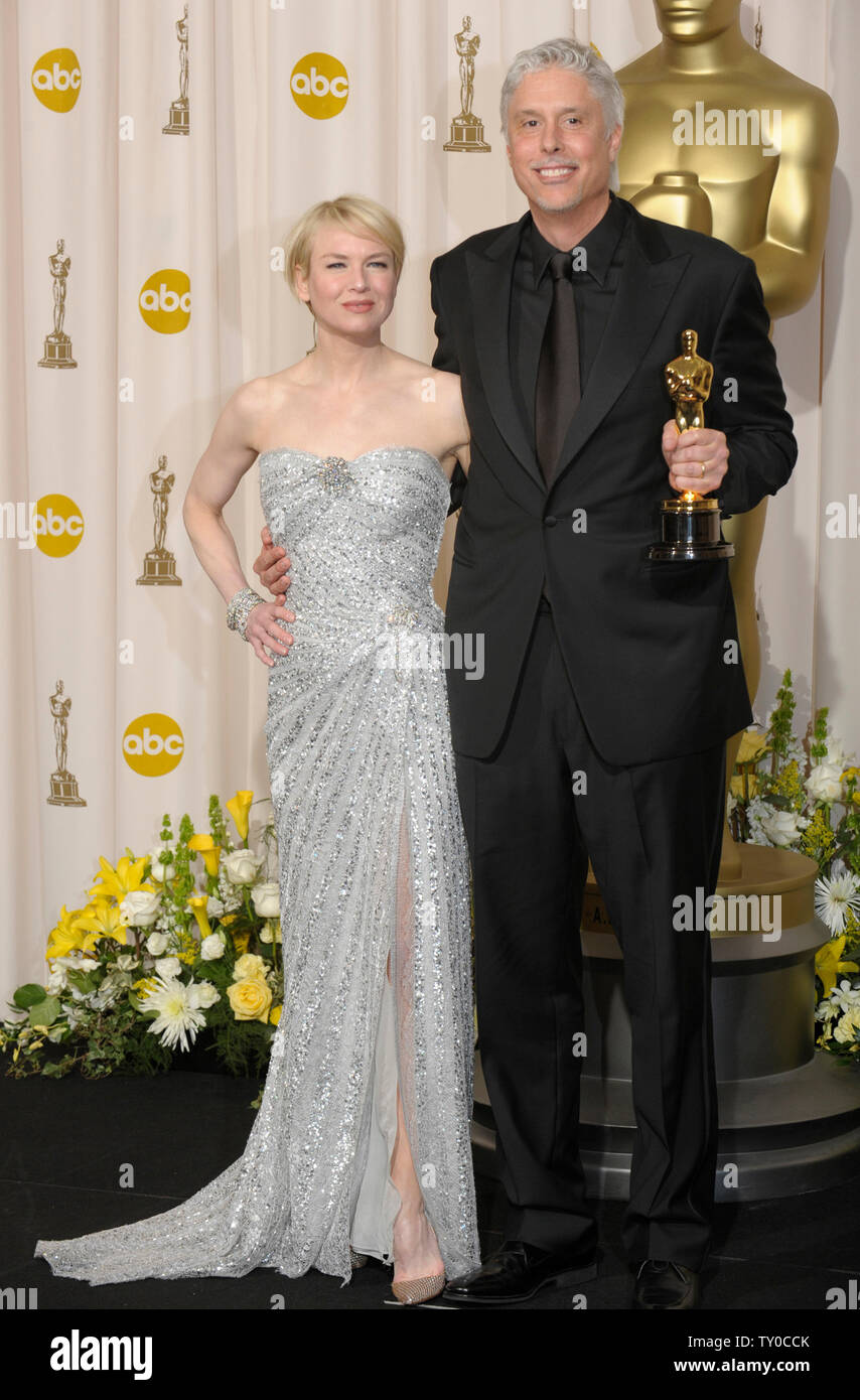 Christopher Rouse holds his Film Editing Oscar for his work on "The ...