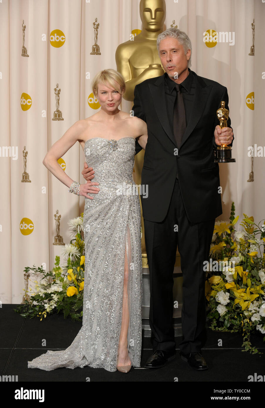 Christopher Rouse holds his Film Editing Oscar for his work on "The ...