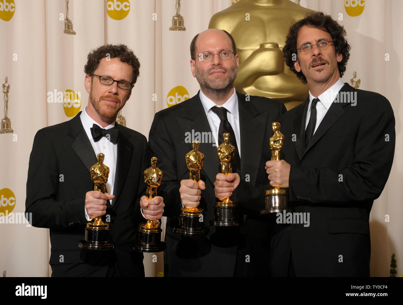 Producers Ethan Coen (L-R) Scott Rudin and Joel Coen pose with their ...