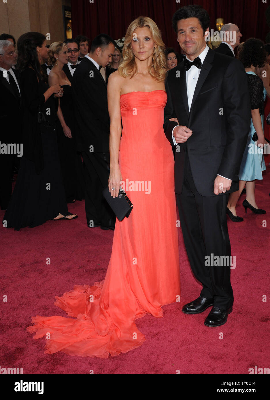 Patrick Dempsey (R) and his wife Jill Fink, arrive for the 80th Annual ...